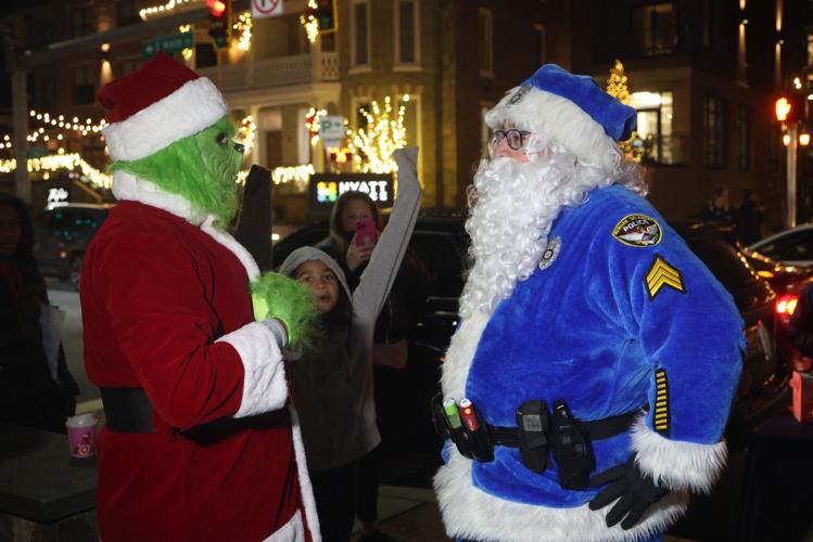 Sgt. Santa hands out presents on Main Street | News Gallery ...