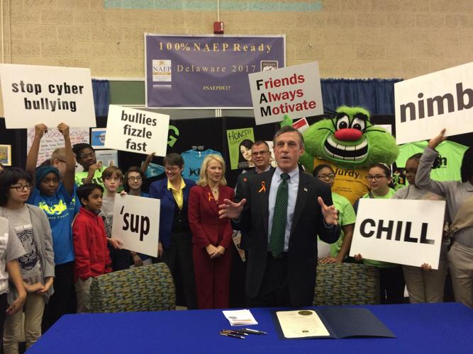 Carney signs teen dating violence awareness proclamation at Shue-Medill ...