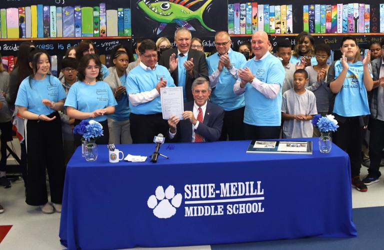 Carney signs dinosaur bill written by Shue-Medill students | News ...