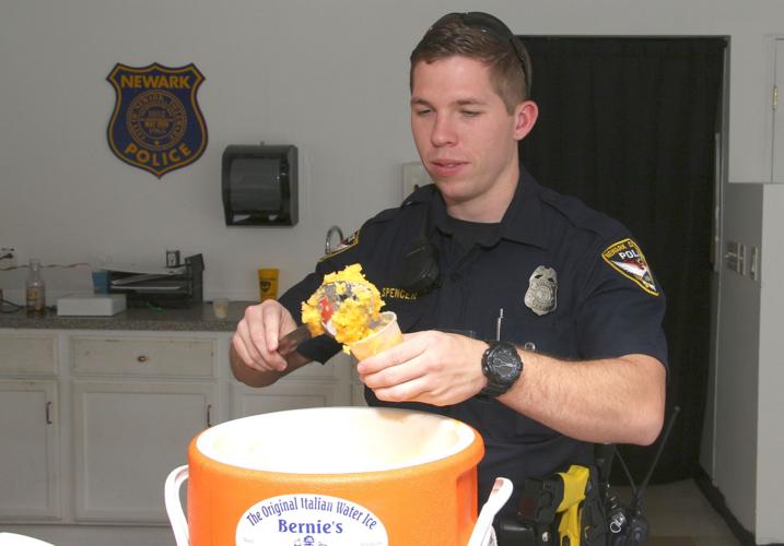 Newark Police officers hand out free water ice | News ...