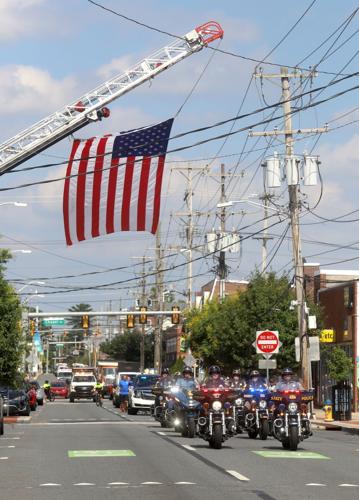 Special Olympics torch carried down Main Street | News ...