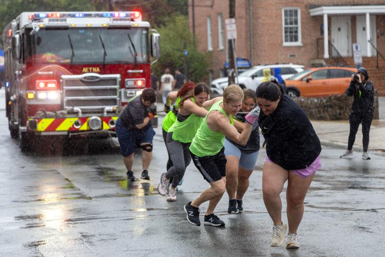 Teams compete to pull a fire truck down Academy Street | News ...