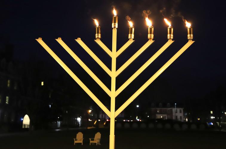'Keep adding light': Students gather for menorah lighting on UD Green ...