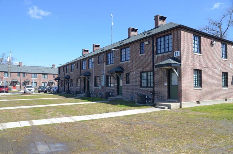 City officials, residents celebrate completion of Craven Terrace ...