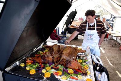 Charities go hog wild over pig cooking event | Local News | newbernsj.com