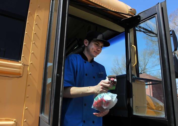 PHOTOS: Free Meals on Big School Wheels | Local News | newbernsj.com