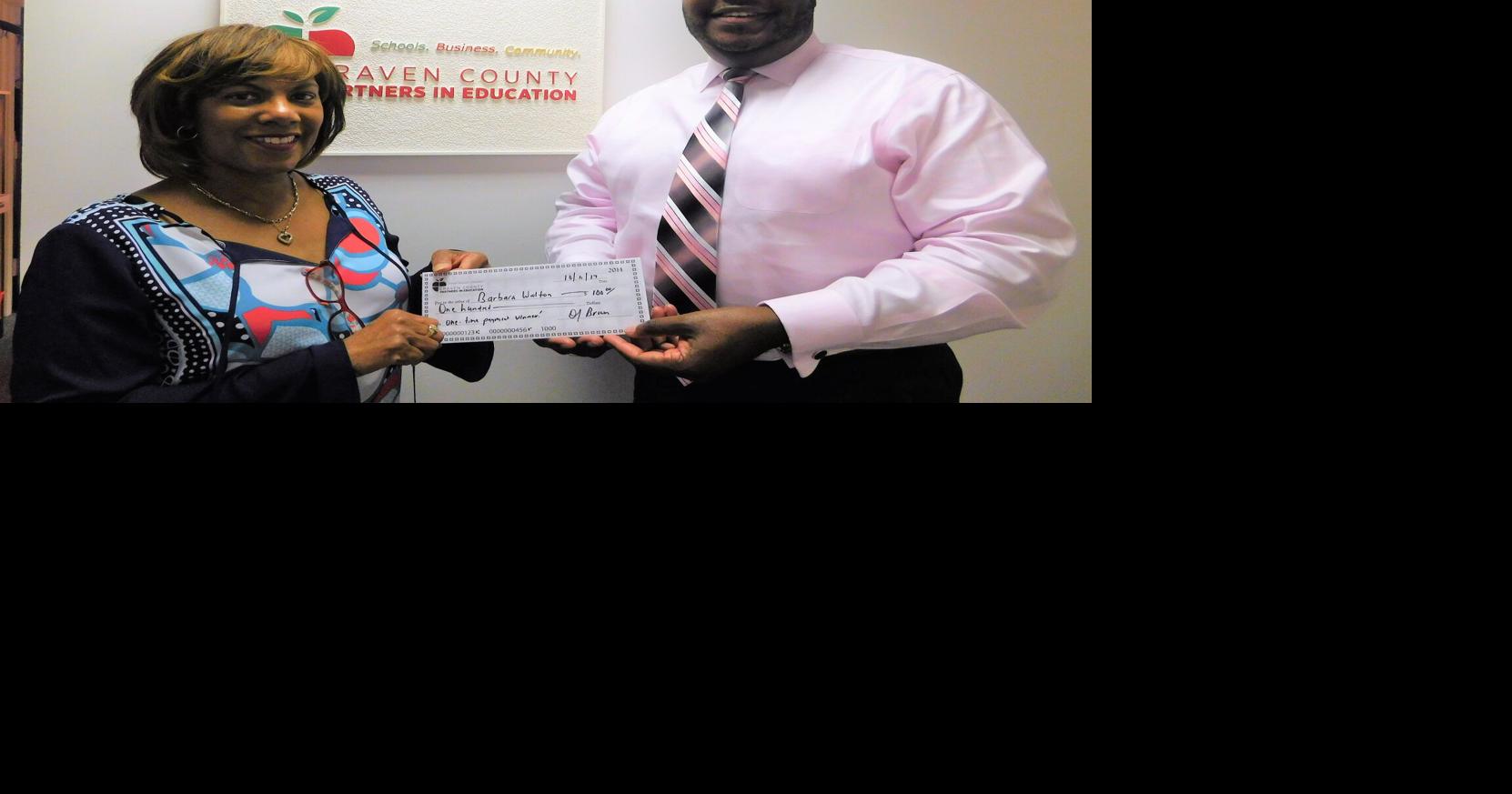 Barbara Walton with J.T. Barber Elementary School accepts her check ...