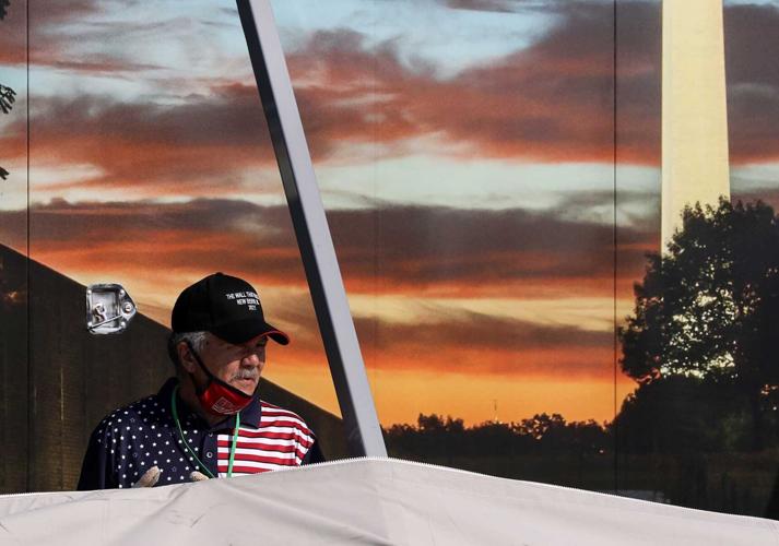 The Vietnam Veterans Memorial Replica Wall - The Wall That Heals exhibit assembled by volunteers ...