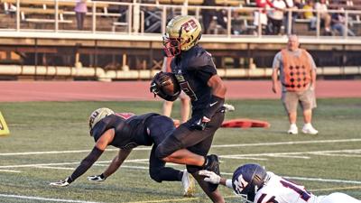 New Britain scores last-minute touchdown to remain undefeated with 36 ...