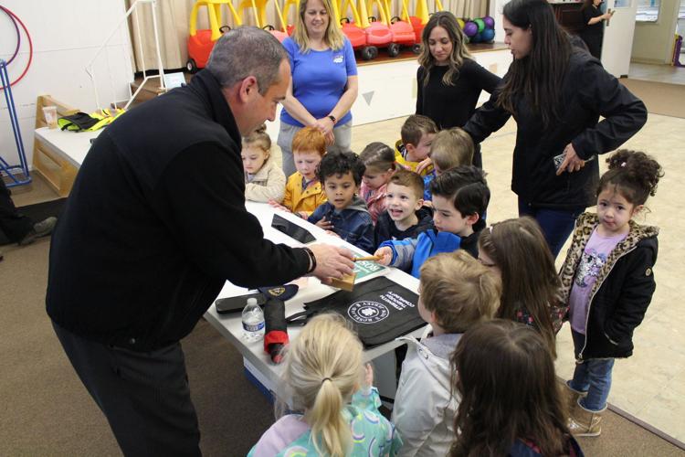 Speakers show and tell children about their jobs | News ...