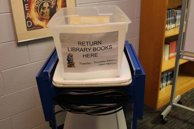 Warren students 'check it out' from school libraries through pandemic ...