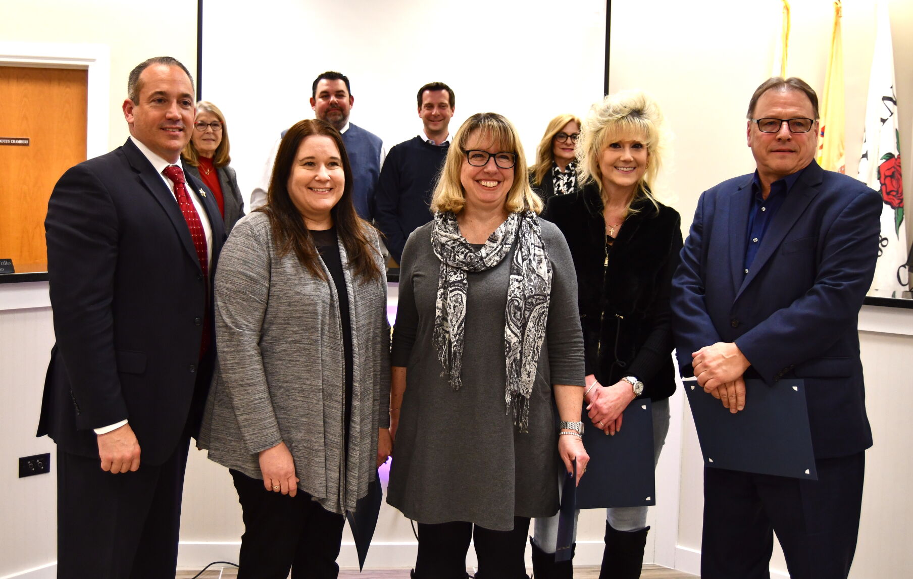 Former business office supervisor, public works officer honored in ...