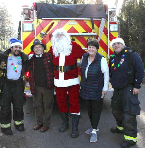Santa brings candy canes and smiles to Essex Fells | News ...