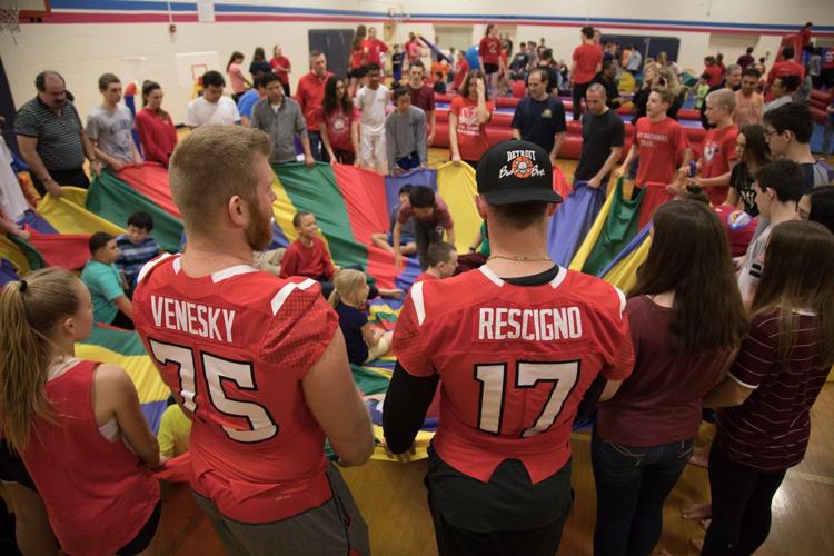 Rutgers athletes help at YMCA program for autistic children in Basking ...