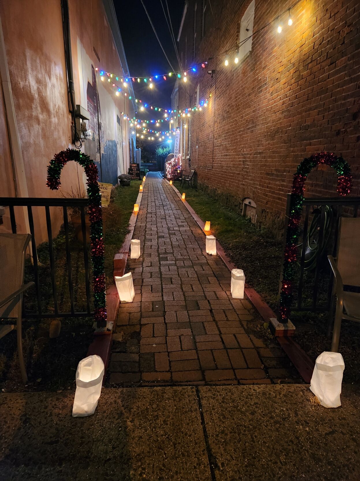Clinton downtown lit by luminaries for Candle Light Night | News ...