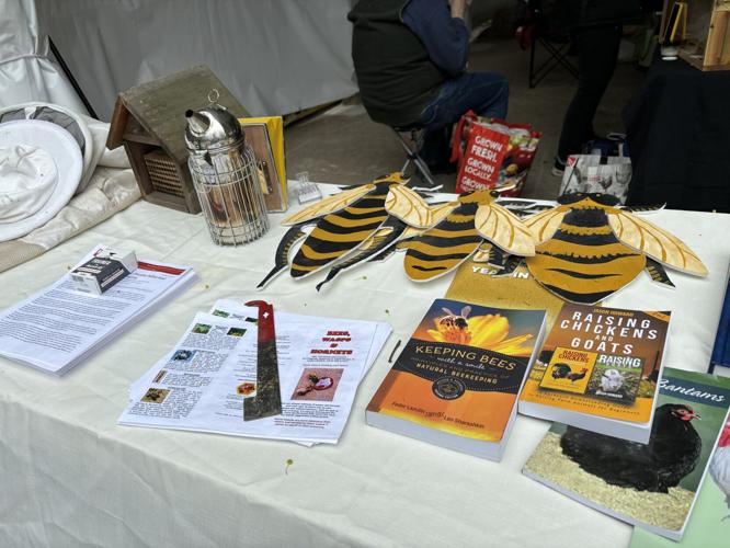 Eco-conscious community members attend Red Goes Green at the Red Mill ...