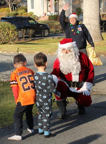 Santa brings candy canes and smiles to Essex Fells | News ...