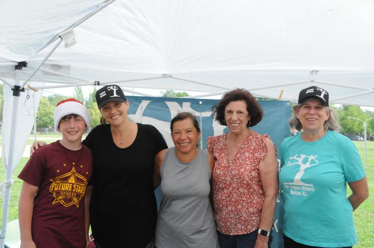 Madison groups bring 'Christmas in July' to farmers market | News ...