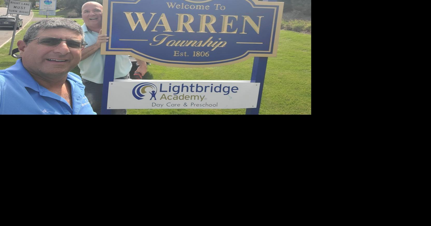 Warren Lions Club members repair and rehang 'Welcome to Warren' sign ...