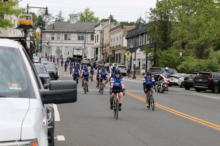 Riding 'for those who died:' Annual Police Unity Tour cycles through en ...