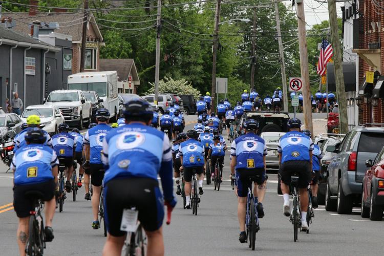 Riding 'for those who died:' Annual Police Unity Tour cycles through en ...