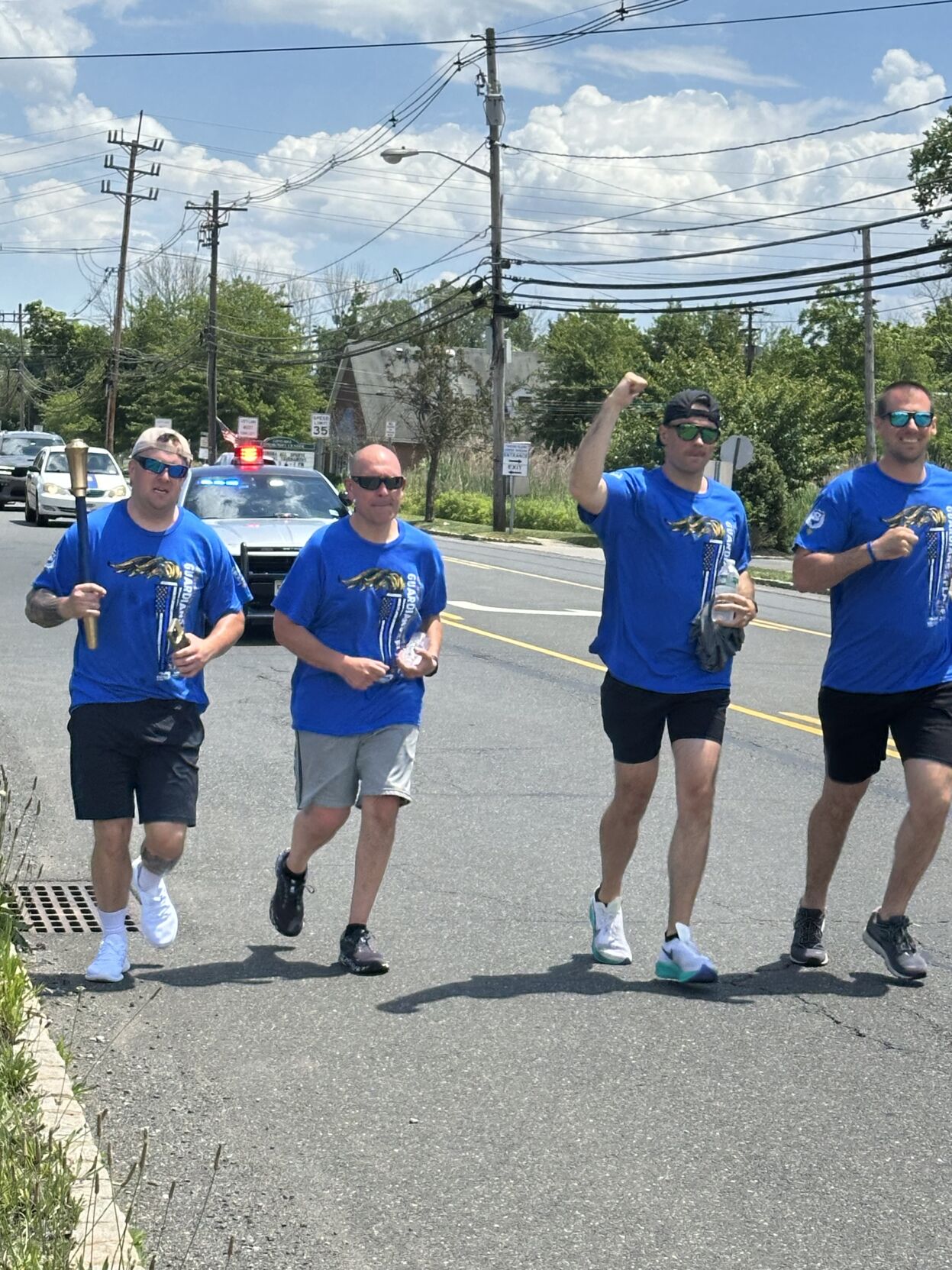 Long Hill police officers participate in the Torch Run to support ...