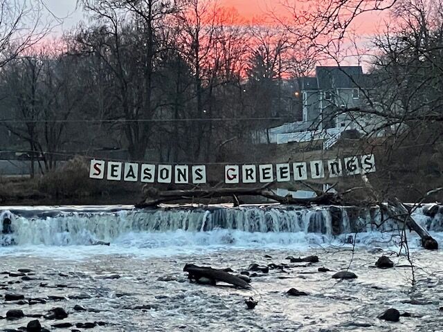 'Seasons Greeting' sign returns to Rockaway, suspended once again ...