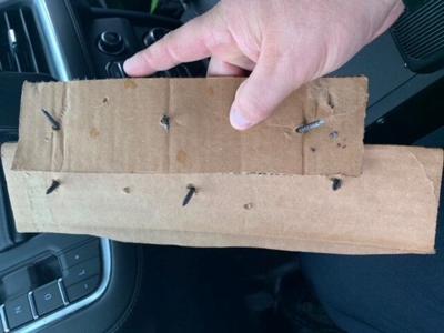 Spike strips found around Dan Cummins car lot | News | news-graphic.com