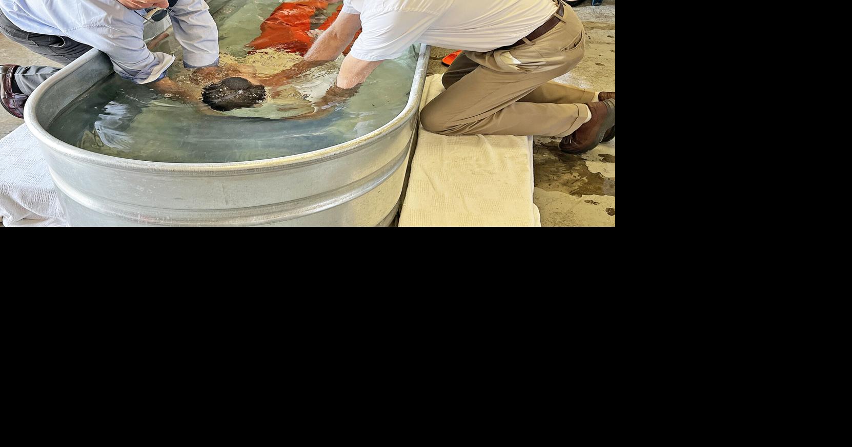 Inmates baptized in detention center service | News | news-graphic.com