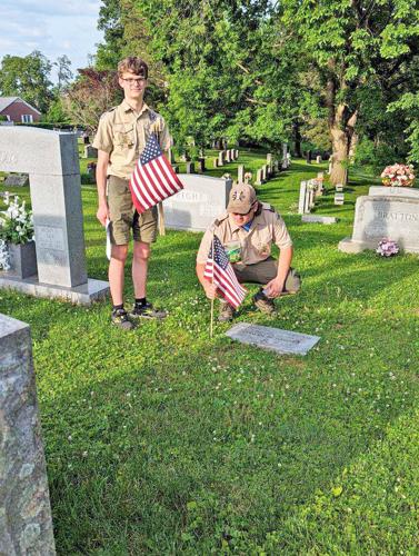 Scott County scouts plant flags on veterans’ graves | News | news ...