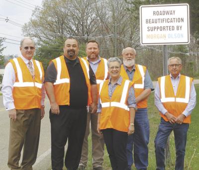 Morgan Olson cleans up litter | Business | news-herald.net