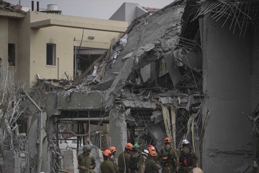 Photos show damage in Haifa and Tel Aviv after Iranian missile barrage