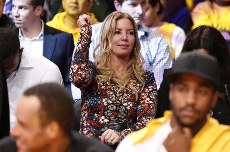 AP source: Buss family to sell controlling stake in Lakers