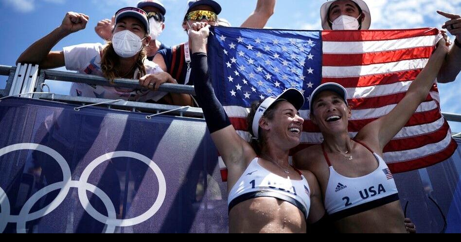 Photos: Olympians proudly display their national flags