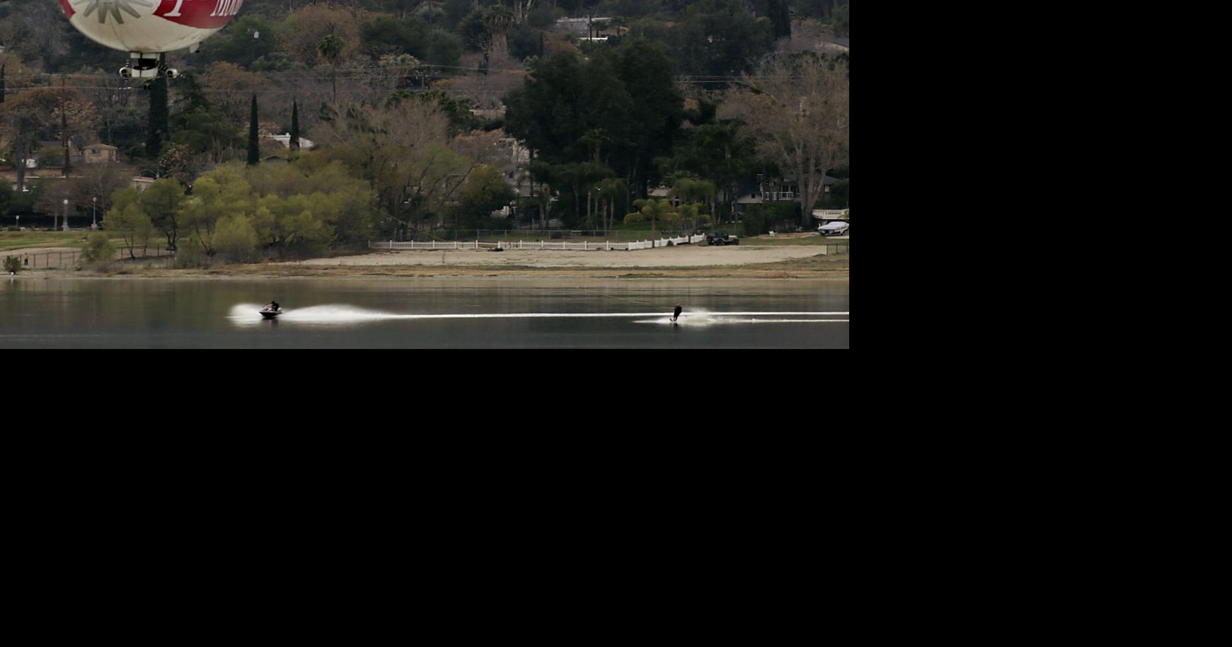 Blimp tows water skier across Southern California lake