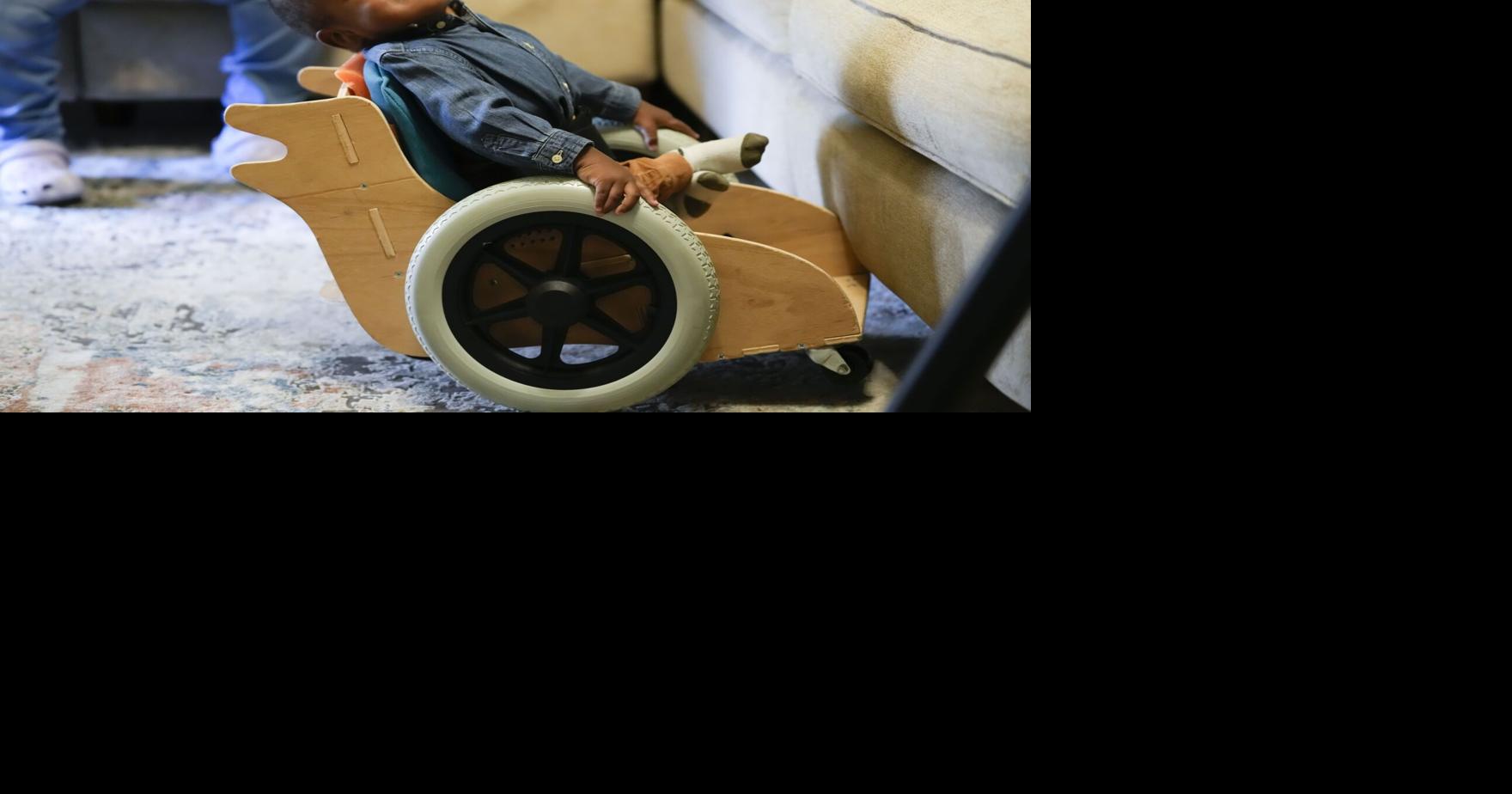 Rolling chair helps toddlers with disabilities move independently
