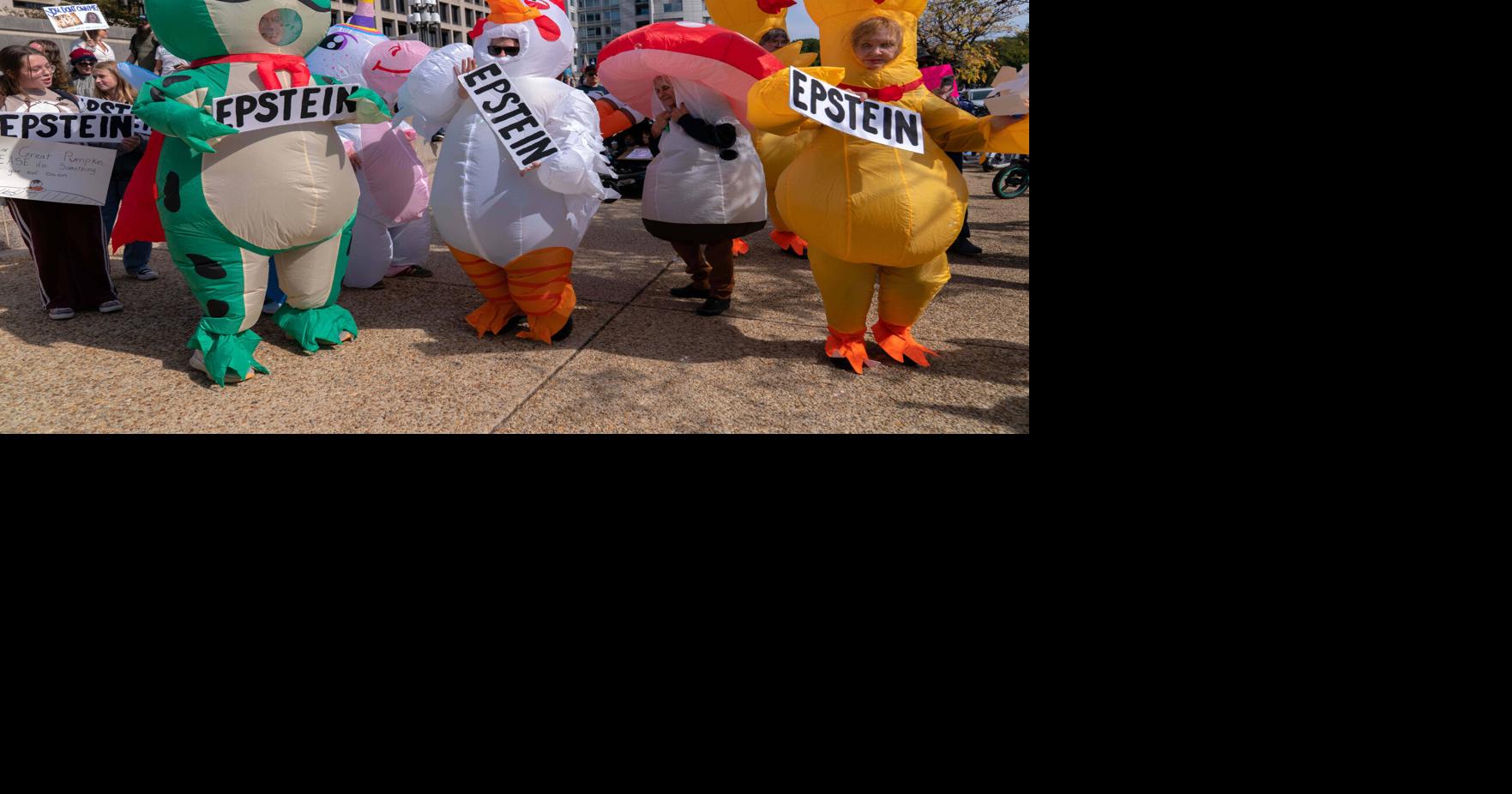 Inflatable costumes used to deflate tensions at rallies against Trump ...