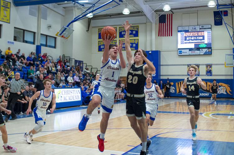 BOYS' BASKETBALL: Warriors out-muscle Hornets | Sports | newsandtribune.com