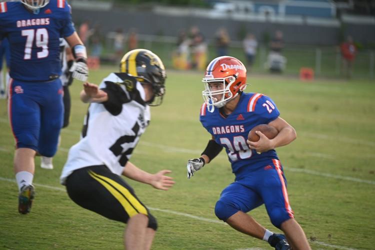 HIGH SCHOOL FOOTBALL: Dragons down Lions | Sports | newsandtribune.com