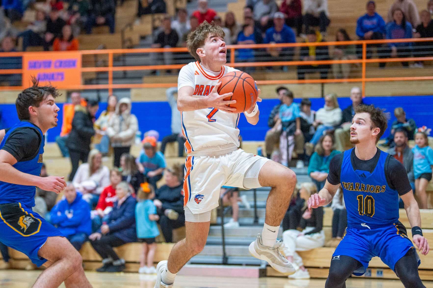 BOYS' BASKETBALL: Huge 3rd period propels Dragons over Warriors ...