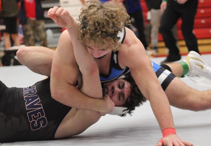BOYS' WRESTLING: Three locals claim regional titles | Sports ...