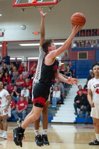 BOYS' BASKETBALL: Beco's buzzer-beater lifts Lions to title | Sports | newsandtribune.com