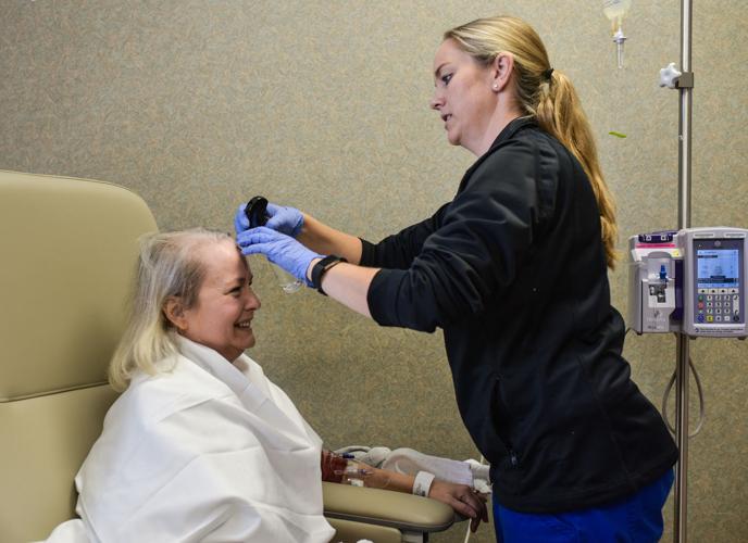 DigniCap helps prevent hair loss in chemotherapy patients | News ...