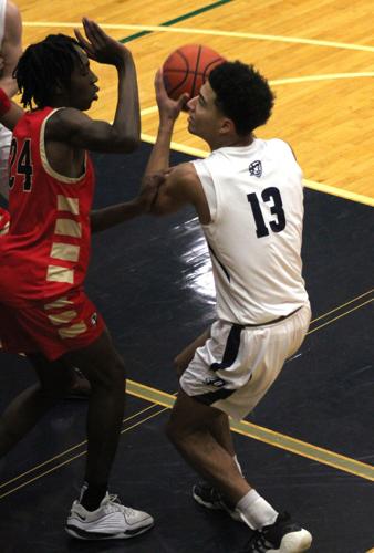 BOYS' BASKETBALL: No. 8 Pioneers pick up 11th victory, defeat Lions ...