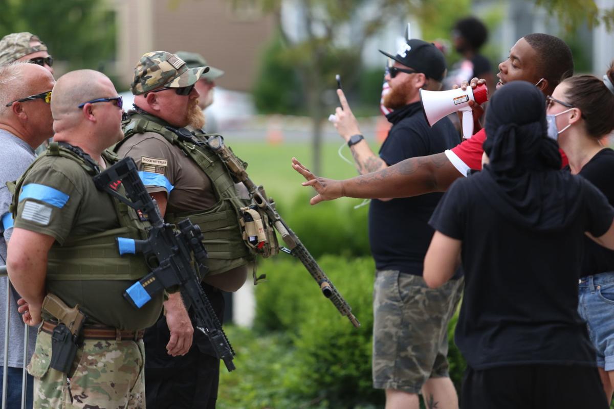 Speakers 'Back the Blue' during rally as protesters continue calls for ...
