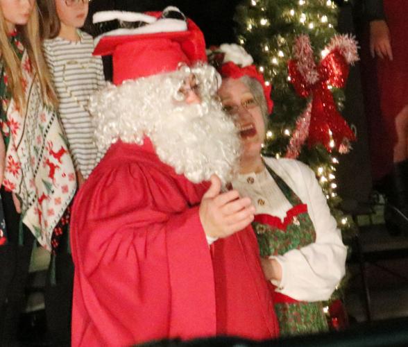 Kids cheer on 'Santa-Grad' at Saint Joseph's College campus ...