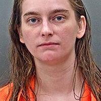 DeMotte woman attempts to damage police car, bite officers | News ...