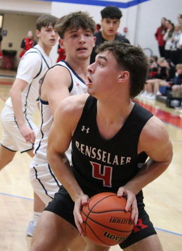 Mathew scores 30 as Bombers hold off Tri-County, 60-53, for first win ...