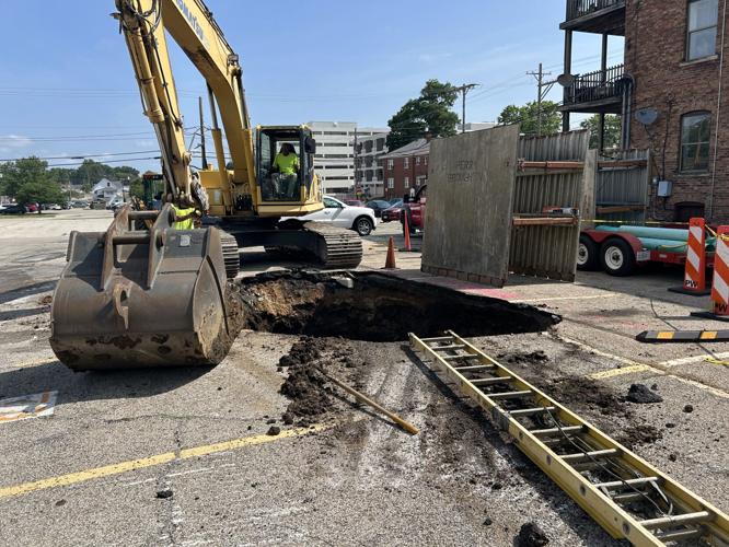 Sinkhole opens outside downtown Springfield office building | Local ...
