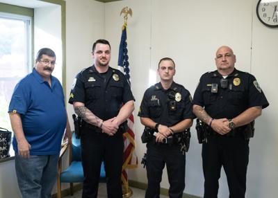 City council promotes two police officers, hires two more | Local ...